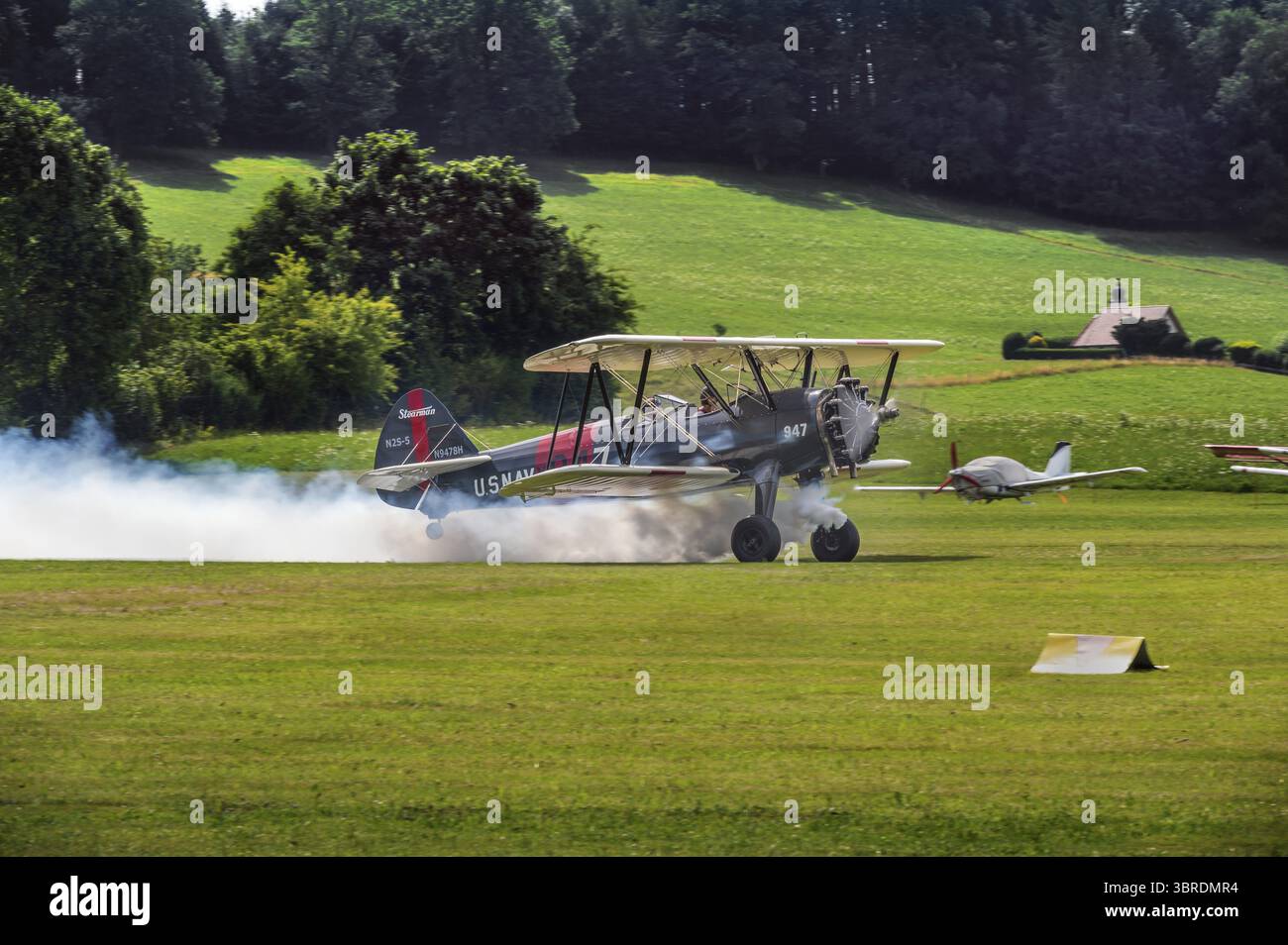 Stearman biplane with radial engine, Boeing B75N1 Stearman, takes off ...