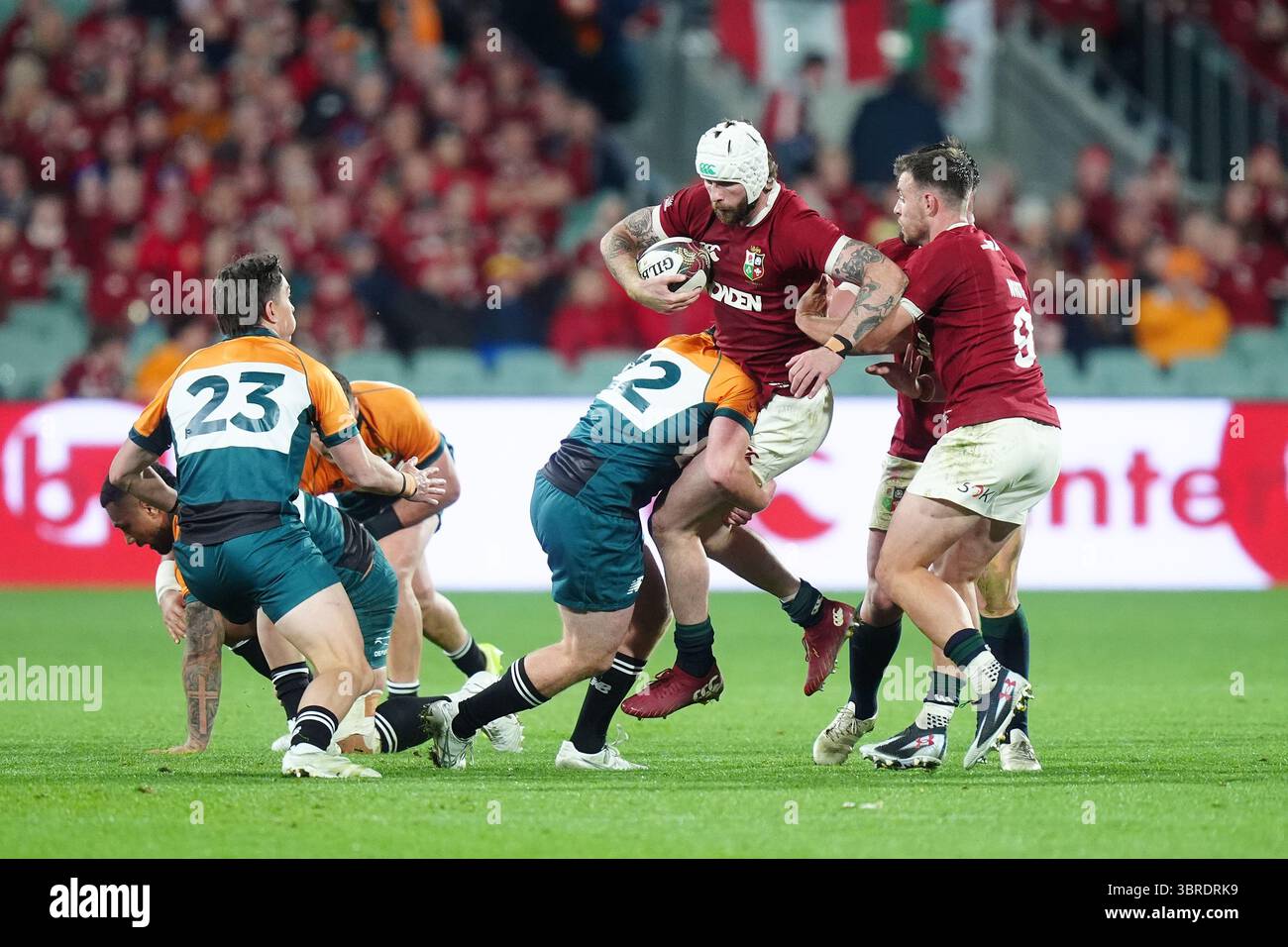British and Irish Lions' Mack Hansen (centre right) is tackled by AUNZ ...