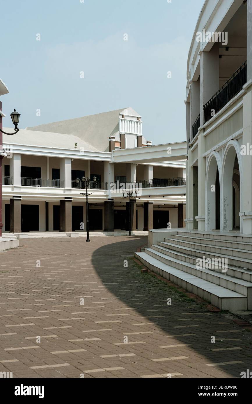 An empty deserted plaza with modern classical architecture building ...