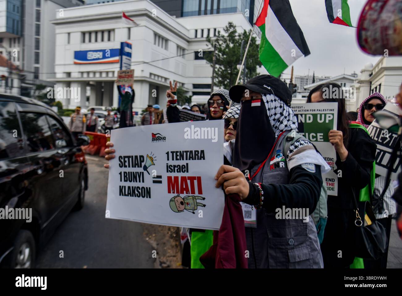July 12, 2025, Bandung, West Java, Indonesia: Protesters unfurled ...