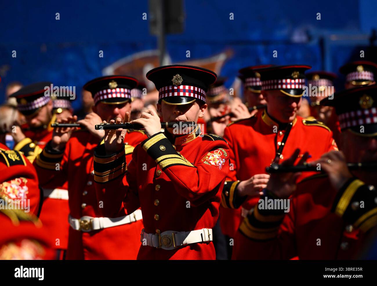 People take part in a Twelfth of July parade in Belfast, part of the ...