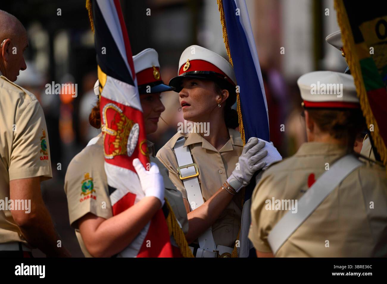 People take part in a Twelfth of July parade in Belfast, part of the ...