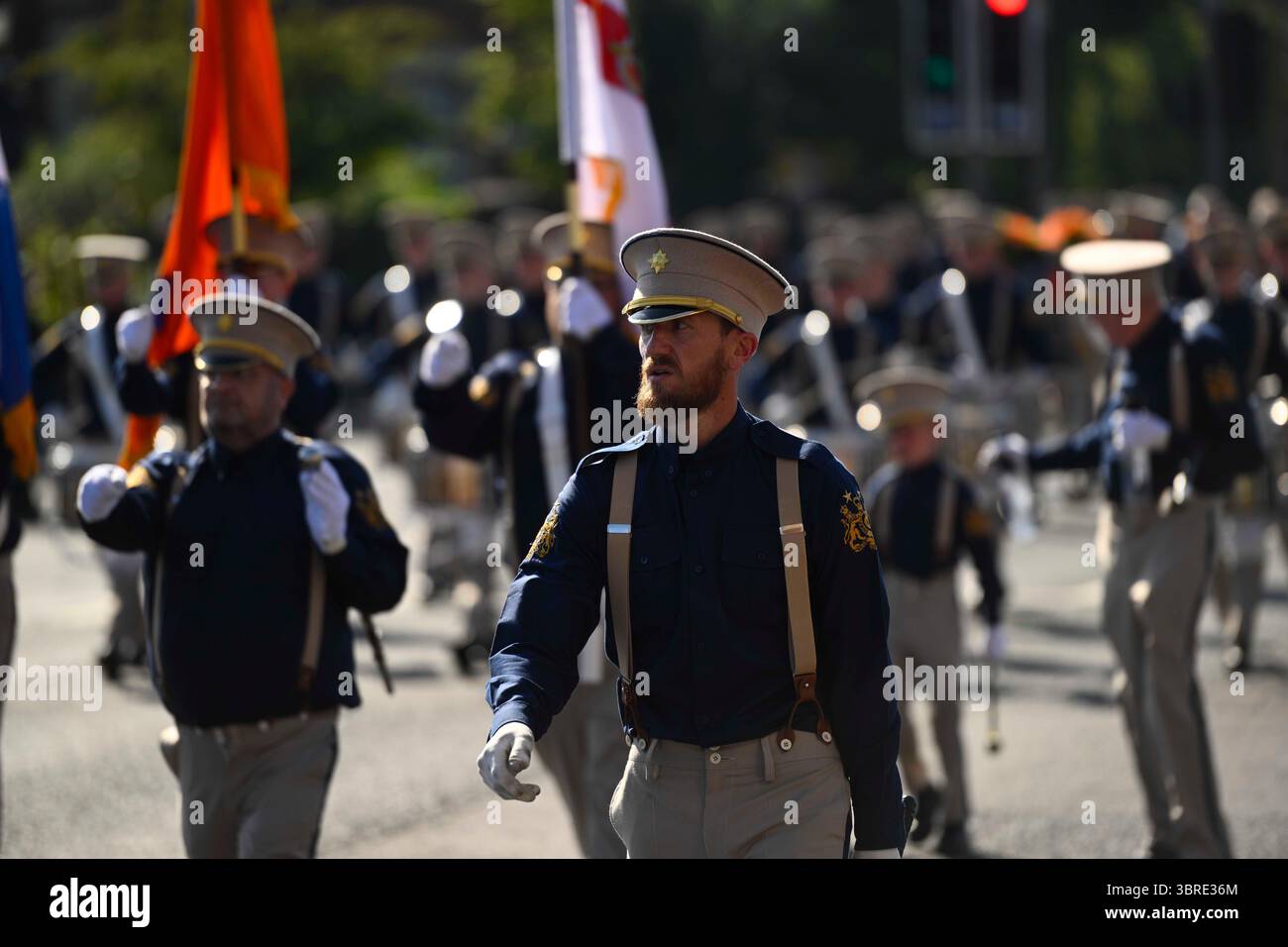 People take part in a Twelfth of July parade in Belfast, part of the ...