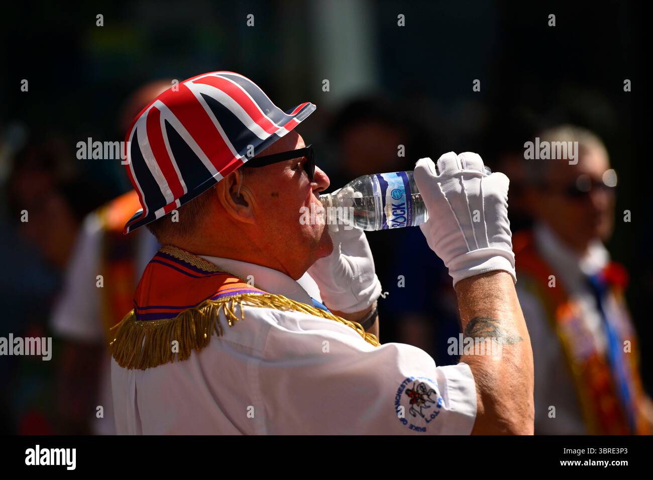 People during a Twelfth of July parade in Belfast, part of the ...