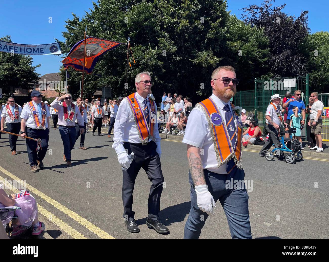 People taking part in the Twelfth of July celebrations in Lisburn, Co ...