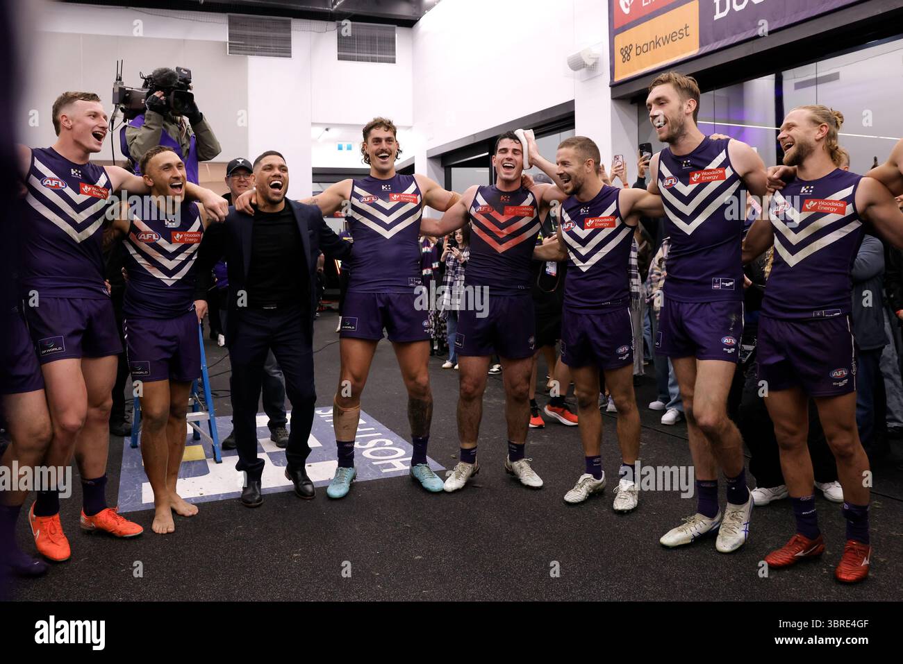 Dockers players sing their club song after winning the AFL Round 18 ...