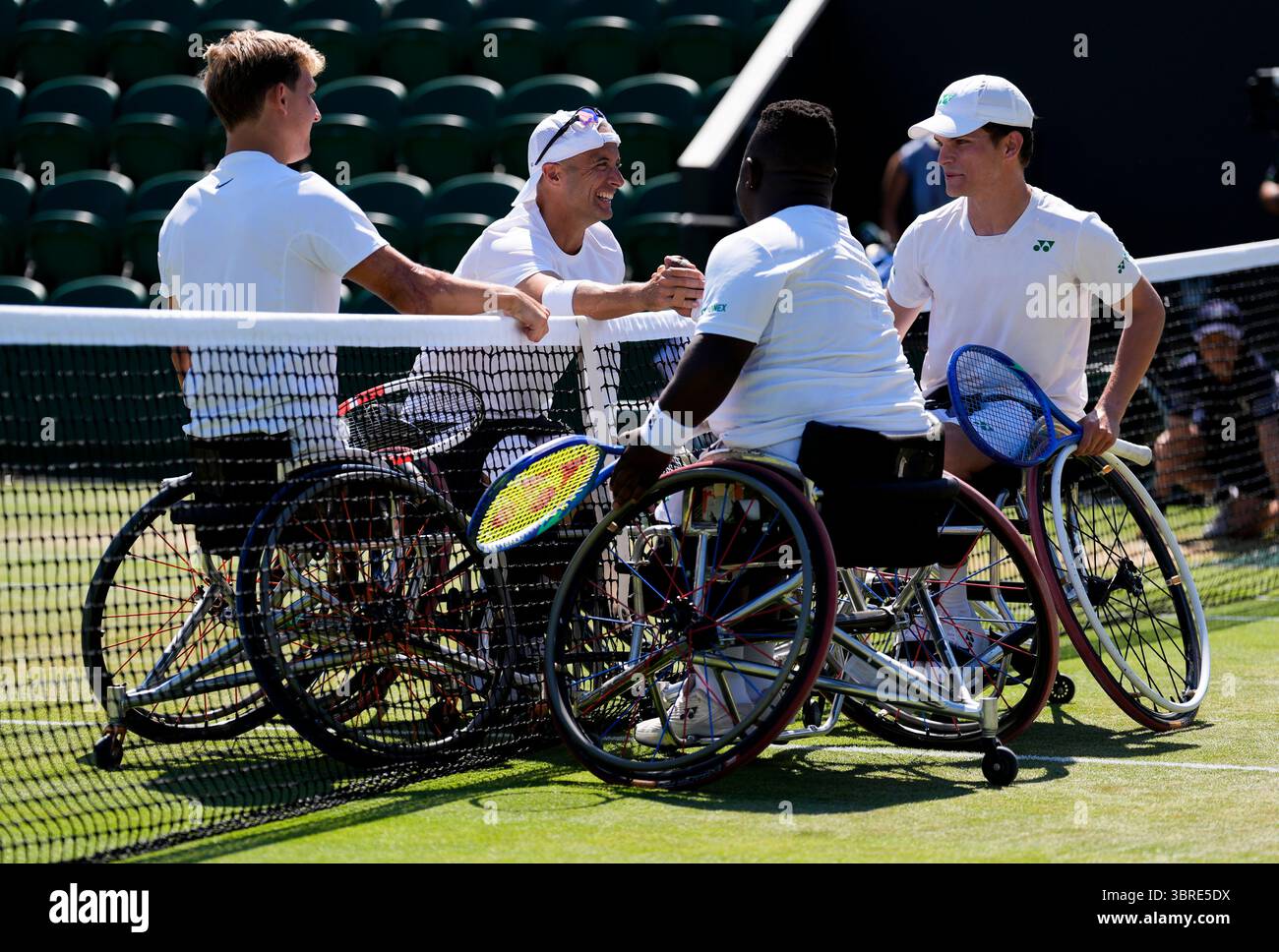 Guy Sasson (second left) and Niels Vink (left) with Donald Ramphadi and ...
