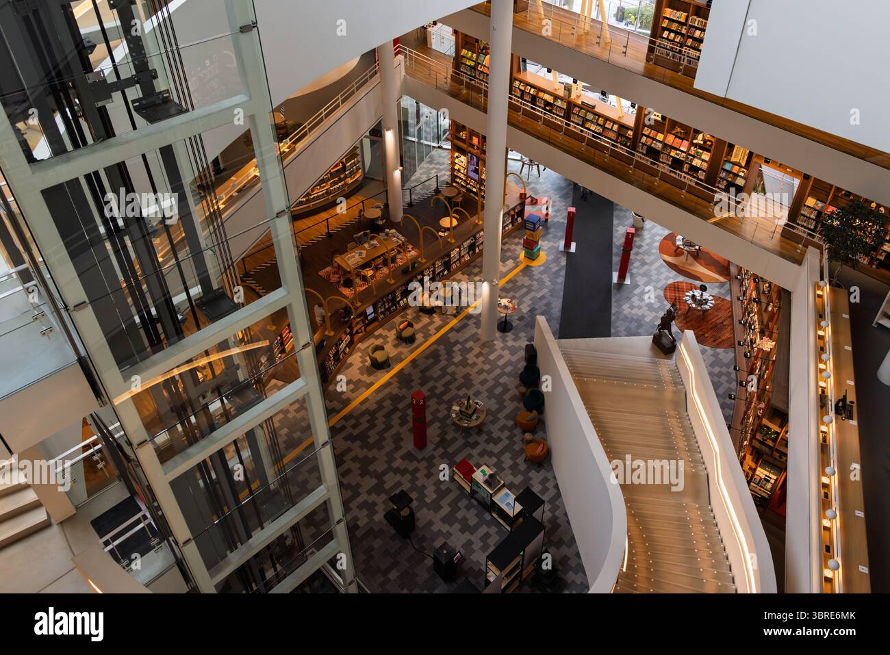 Nieuwegein town hall. Modern library interior with multiple levels, showcasing contemporary ...
