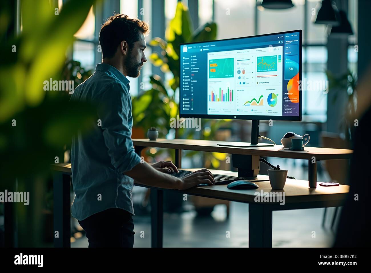 Professional workspace featuring large monitor displaying comprehensive ...