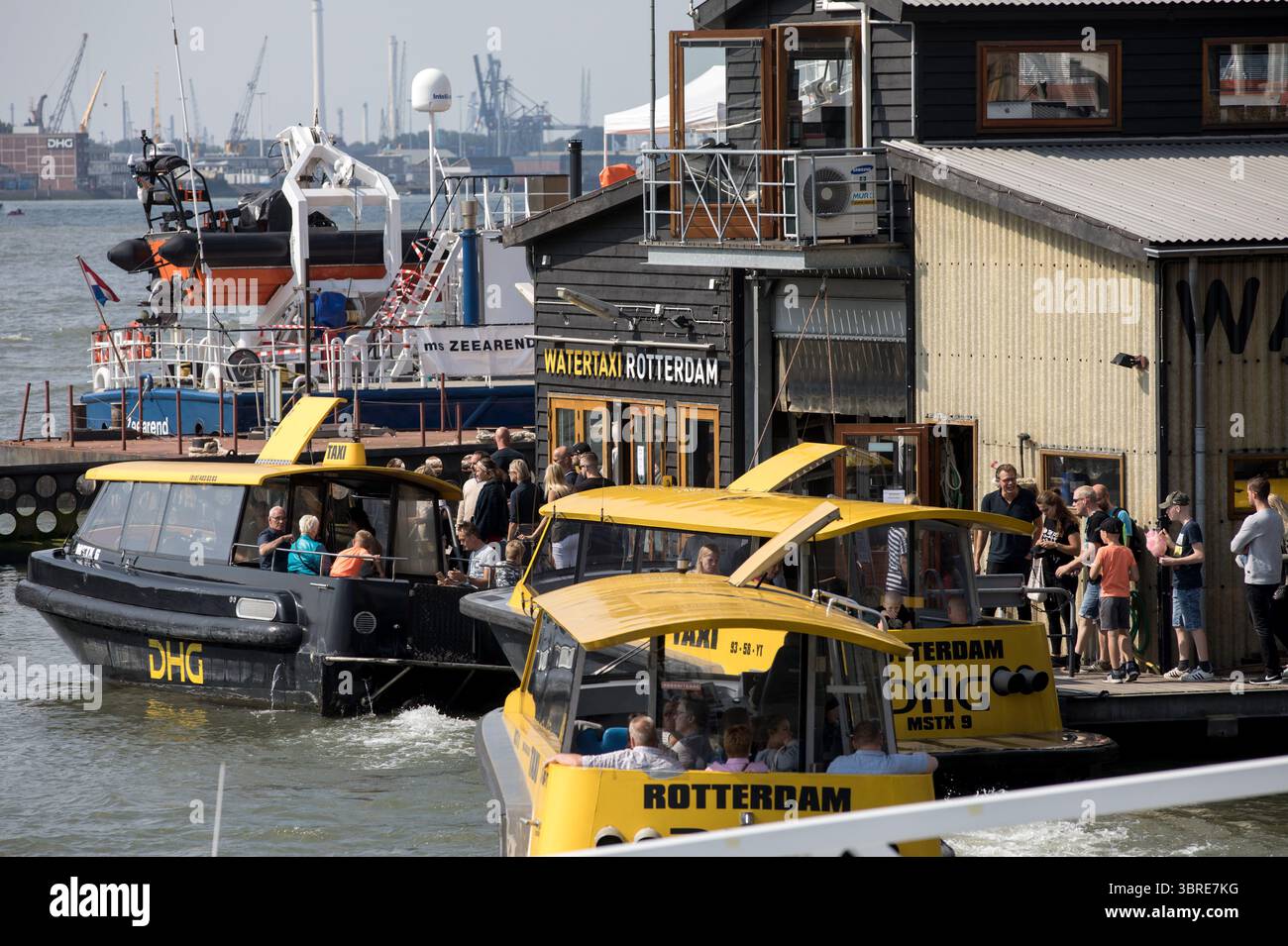 Water taxi in the port of Rotterdam, with a speed of 50kmh. he ...