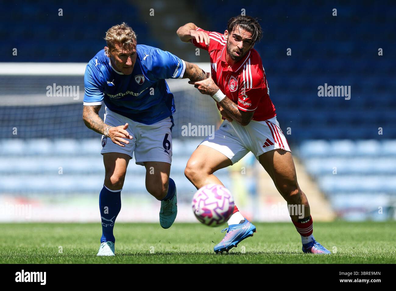 Chesterfield's Kyle McFadzean (left) and Nottingham Forest's Jota Silva ...