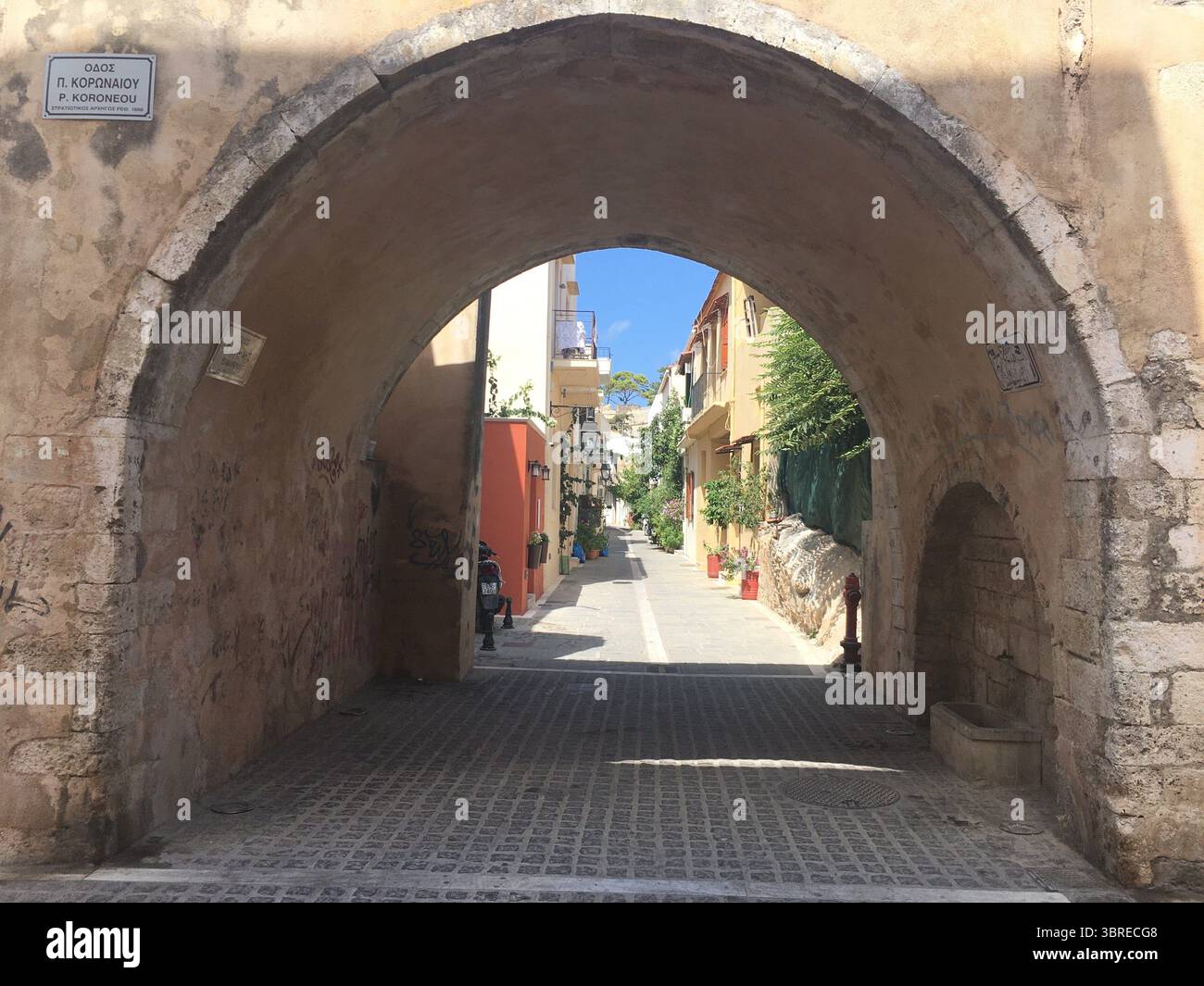 Coastal town and beach scenes in Crete, featuring turquoise waters ...