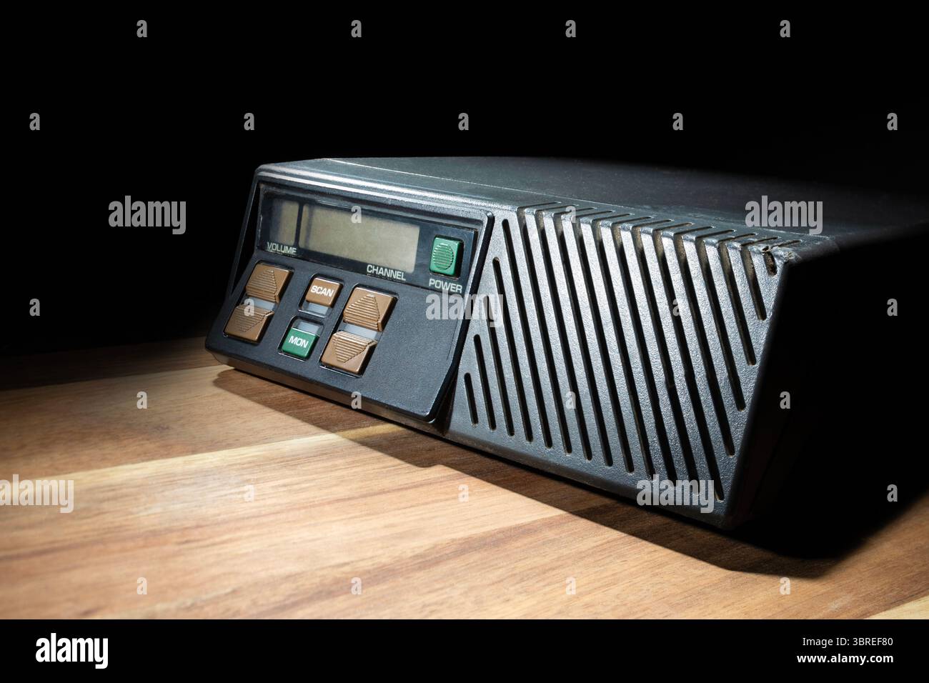 Amateur radio used on VHF frequencies on a wood table in a dark room ...