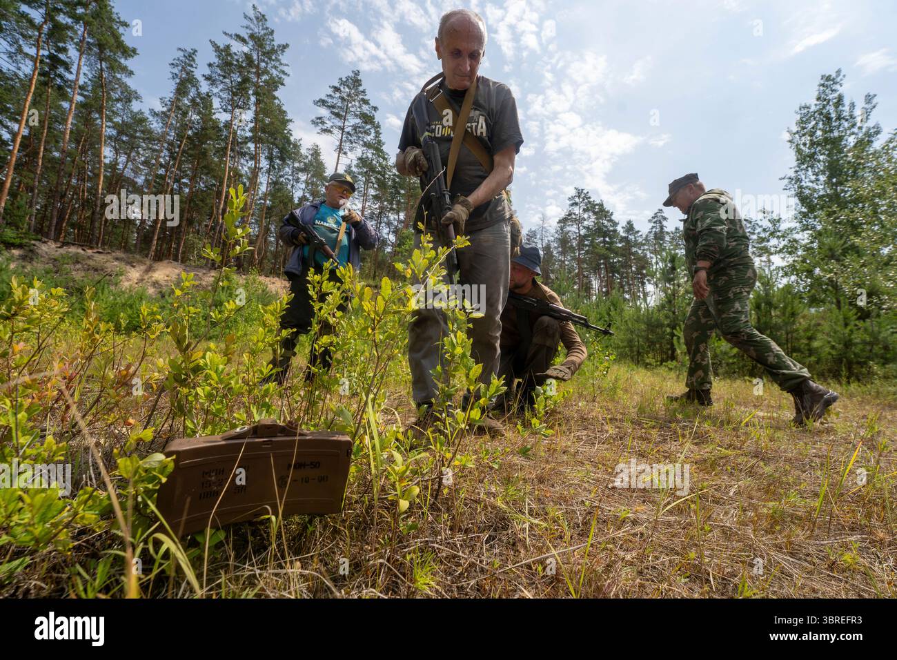 Civilians practice military skills on a training ground in Kharkiv ...