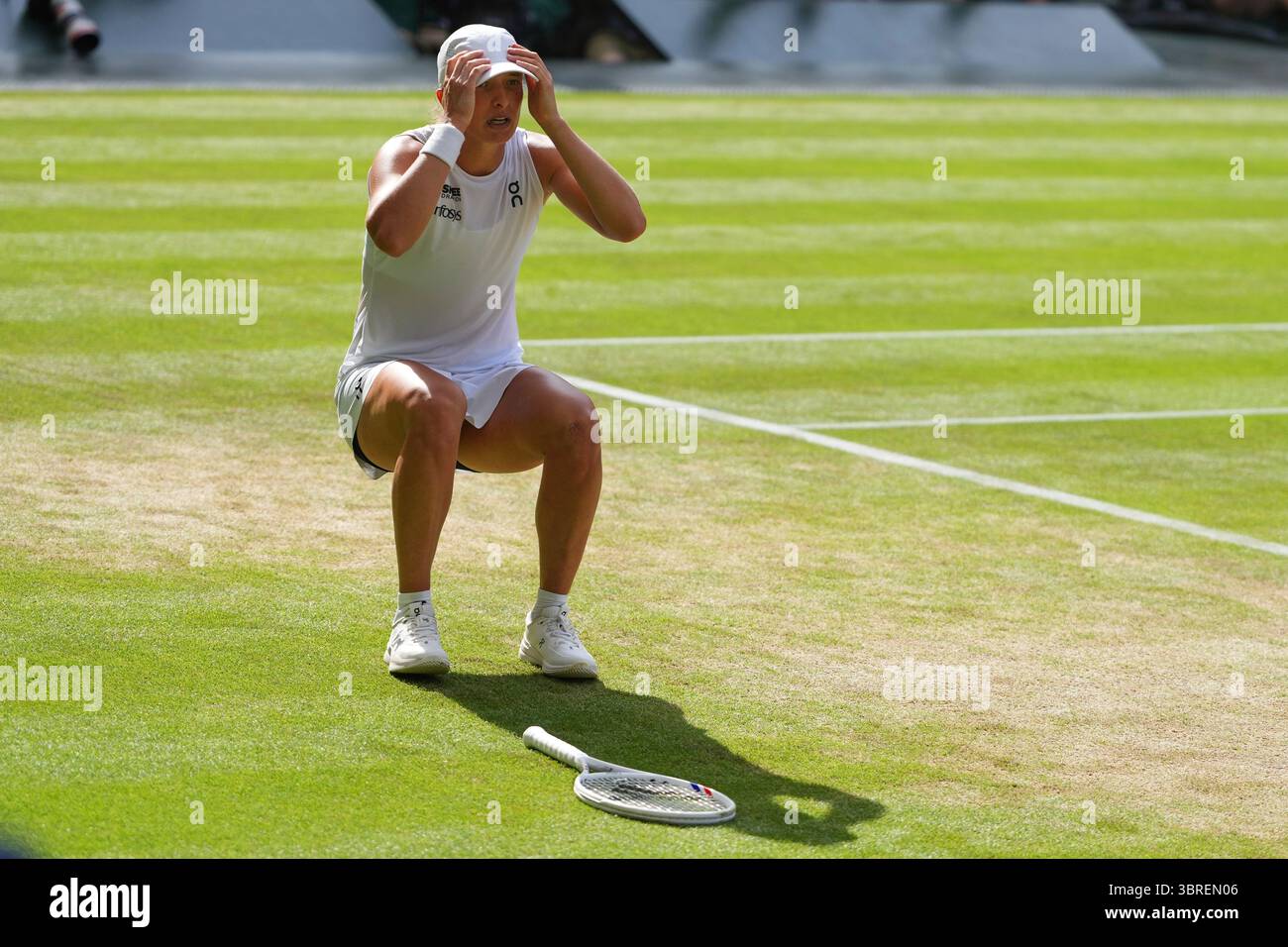 Iga Swiatek of Poland celebrates winning the women's singles final ...