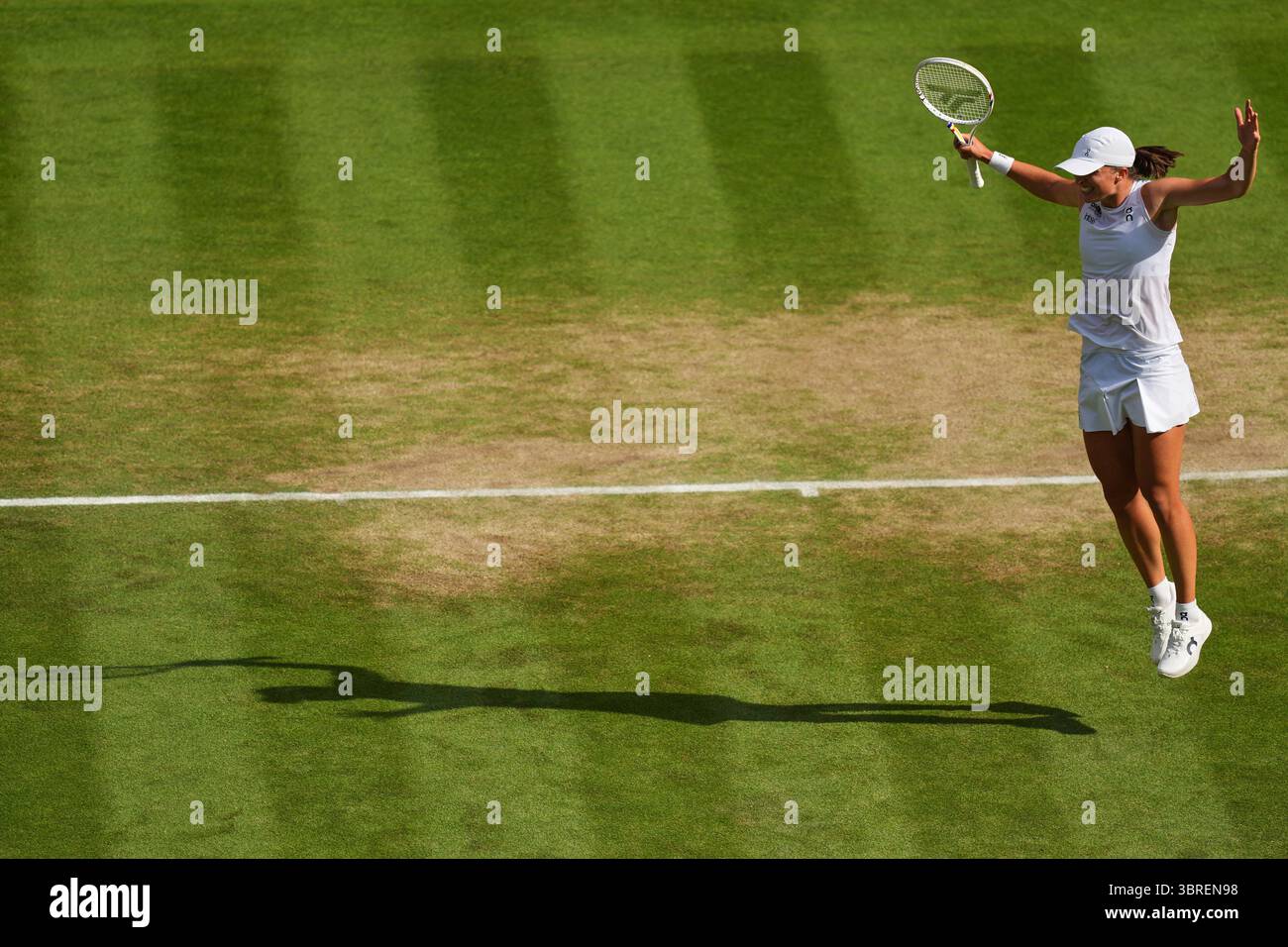 Iga Swiatek of Poland celebrates winning the women's singles final ...