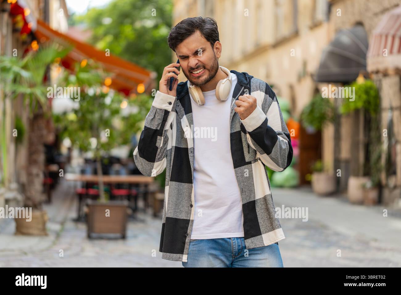 Angry guy walk shout loudspeaker hi-res stock photography and images ...