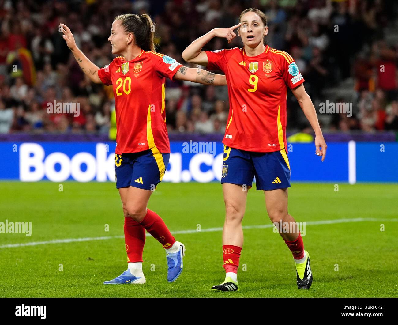 Spain's Esther Gonzalez (right) celebrates scoring their side's third ...