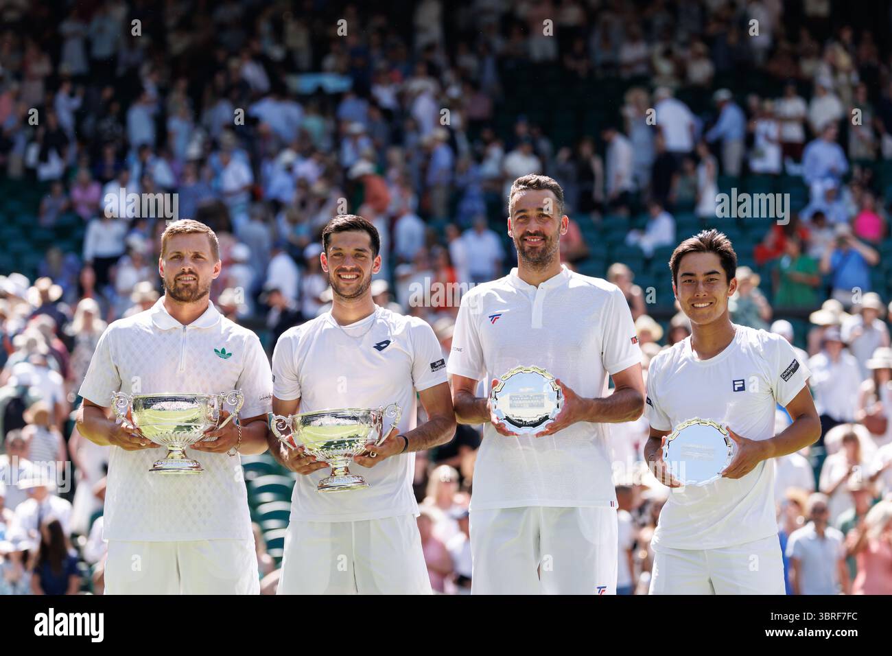 Wimbledon, UK. 12th July, 2025. Julian Cash (GBR), Lloyd Glasspool (GBR ...