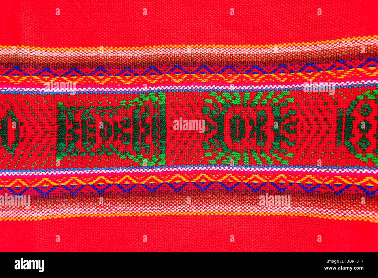 Colorful hand-woven Inca textile background with ancient designs from ...