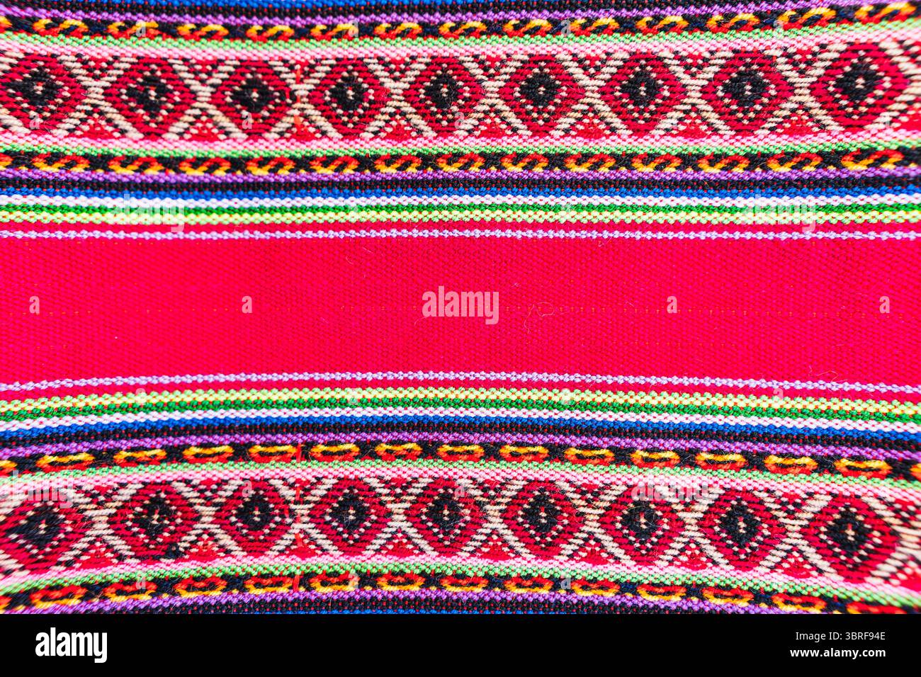 Colorful hand-woven Inca textile background with ancient designs from ...