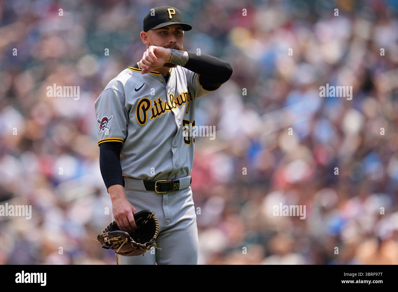 Pittsburgh Pirates starting pitcher Mike Burrows (53) walks back to the ...