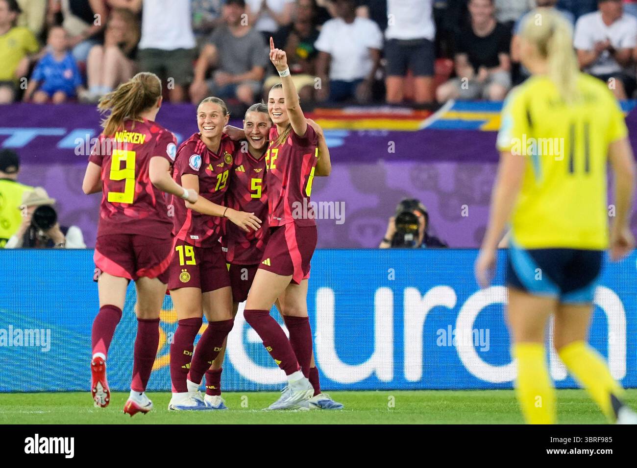 Germany's Jule Brand raises her arm celebrating after scoring the ...