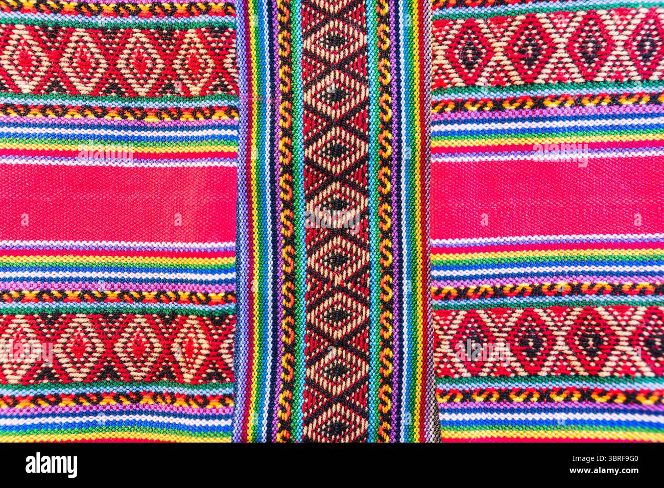 Colorful hand-woven Inca textile background with ancient designs from ...
