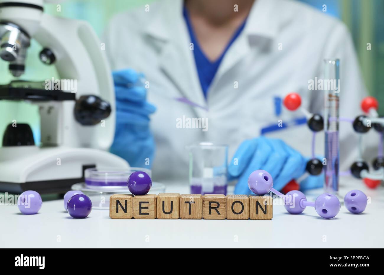 A laboratory scene highlighting the role of neutrons and microscopy in ...