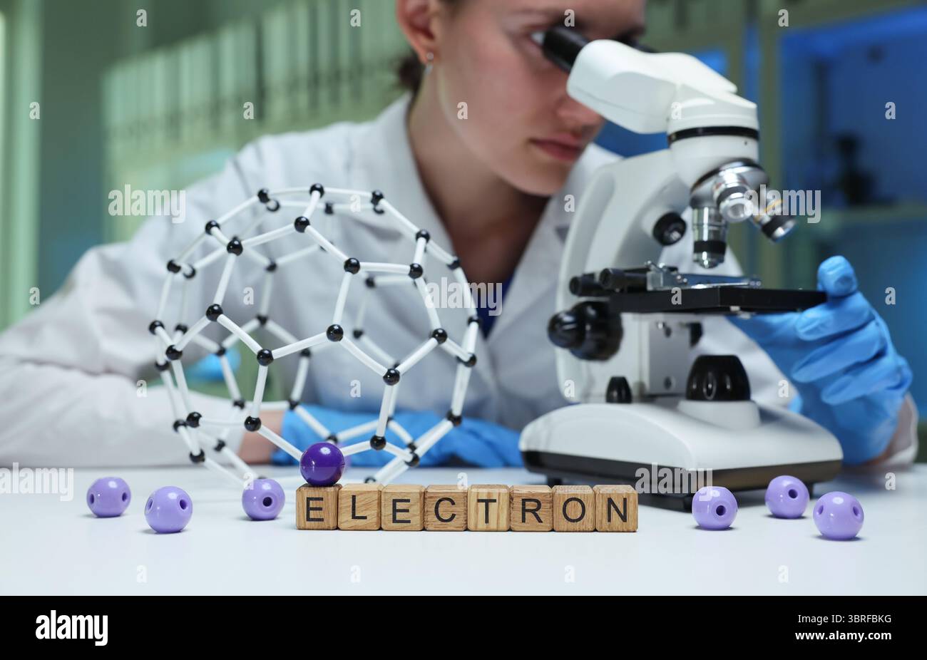 A Scientist Engaged in Observing Electron Microscopy While Utilizing a ...