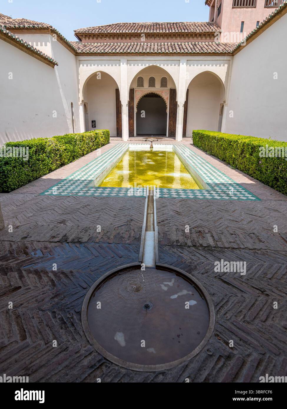 Andalusian courtyard in the Alcazaba of Málaga, with traditional ...