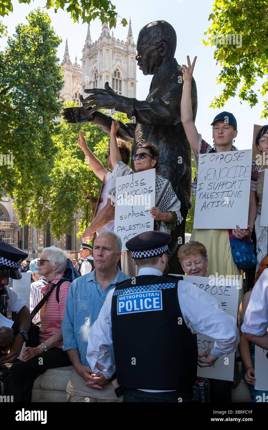 12 JUN 2025, London / UK Protesters gathered outside Parliament holding ...