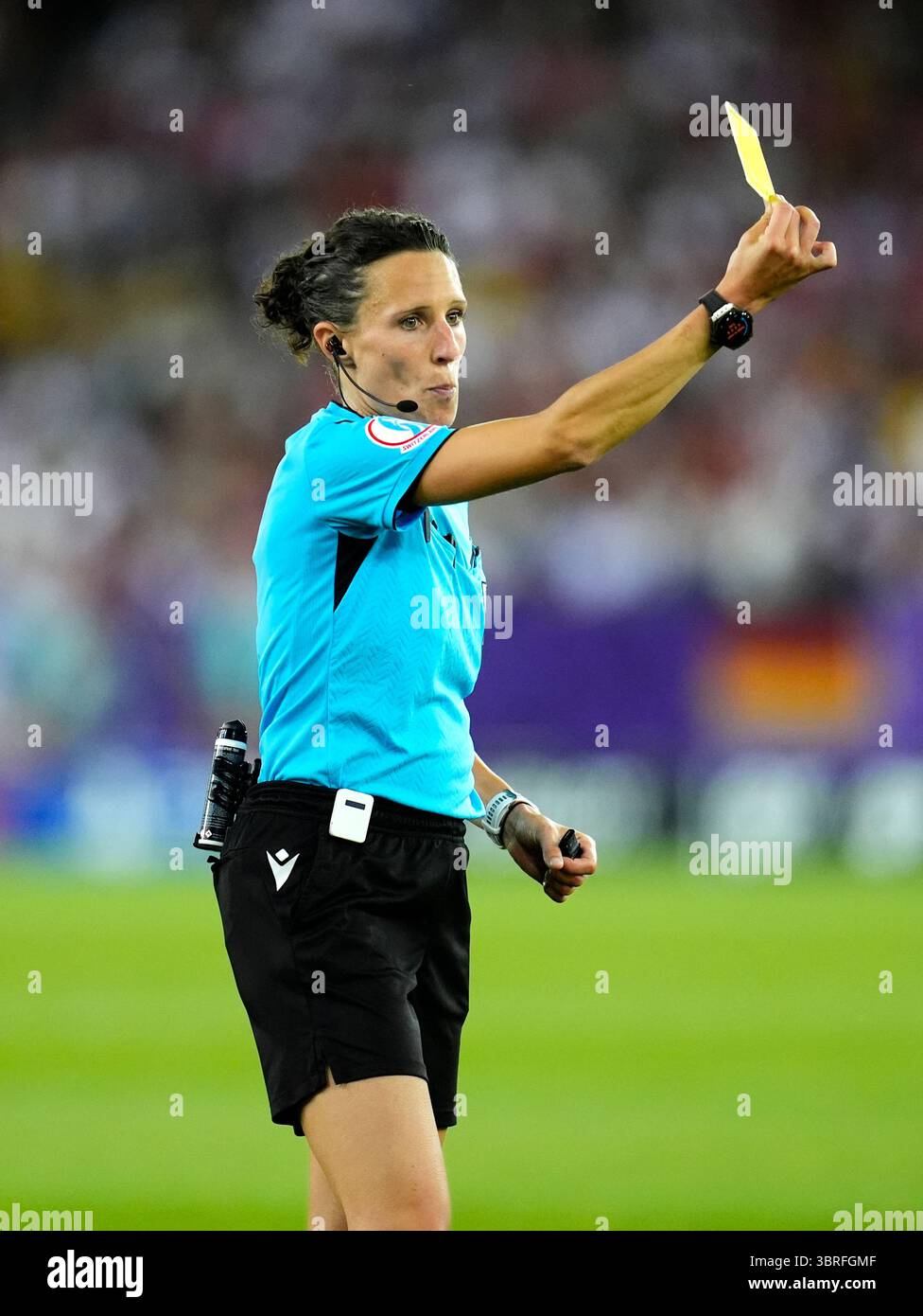 Referee Silvia Gasperotti shows a yellow card to Germany's Jule Brand ...