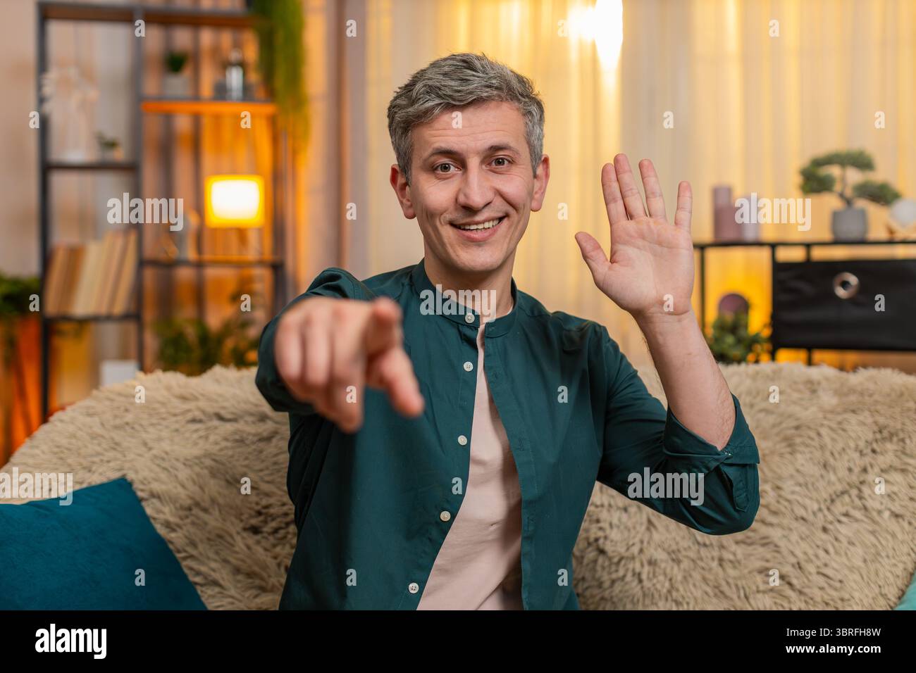 Young man excitedly shows hi-res stock photography and images - Alamy
