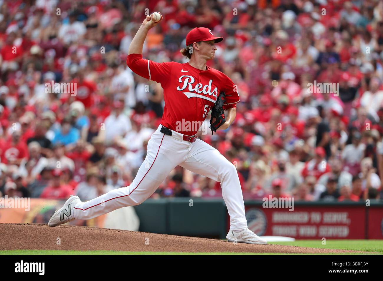 Cincinnati Reds pitcher Brady Singer (51) delivers a pitch during the ...