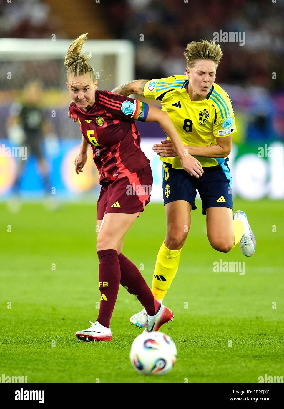 Germany's Janina Minge (left) and Sweden's Lina Hurtig battle for the ...