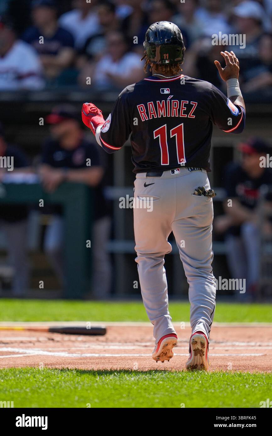 Cleveland Guardians' José Ramírez (11) scores on a single from Carlos ...