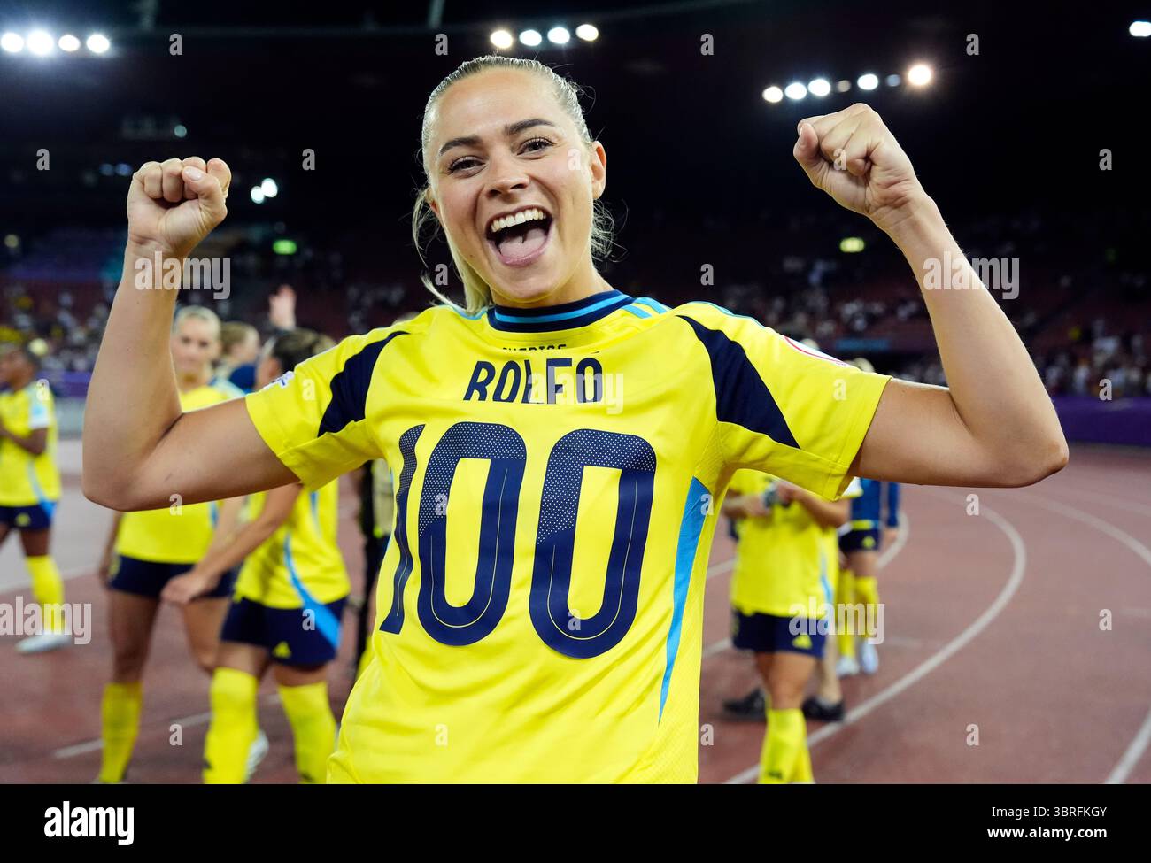 Sweden's Fridolina Rolfo (centre) celebrates 100 international caps ...