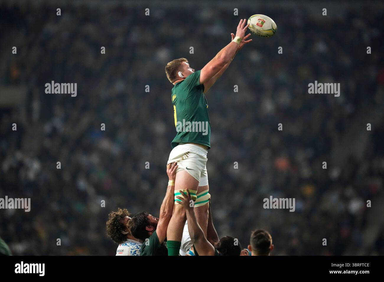 South Africa's Marco van Staden wins a line out against Italy's ...