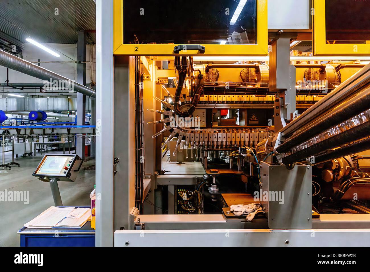 Automatic blow molding machine hi-res stock photography and images - Alamy