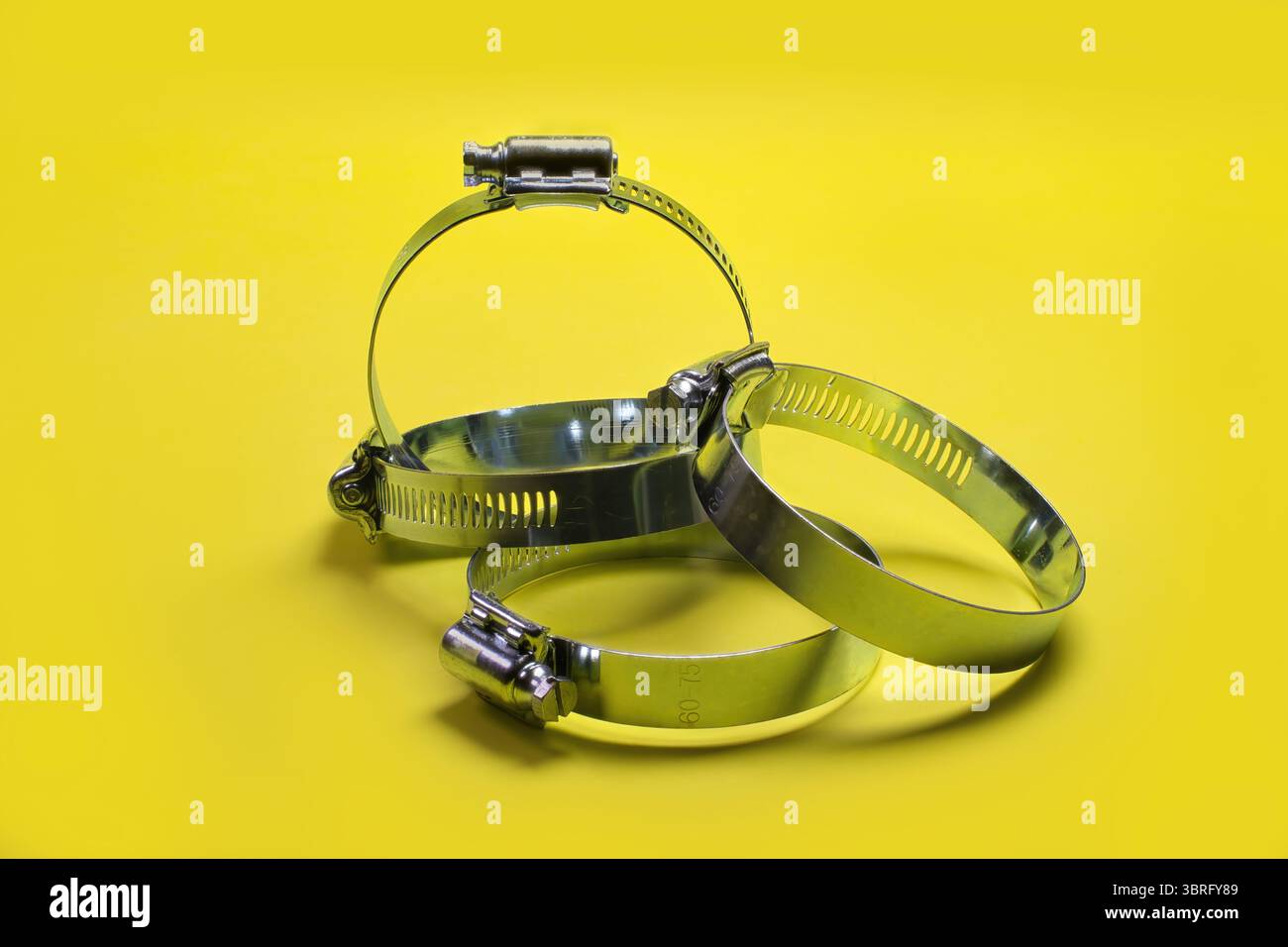 Metal hose clamps are essential plumbing tools, securing hoses and ...