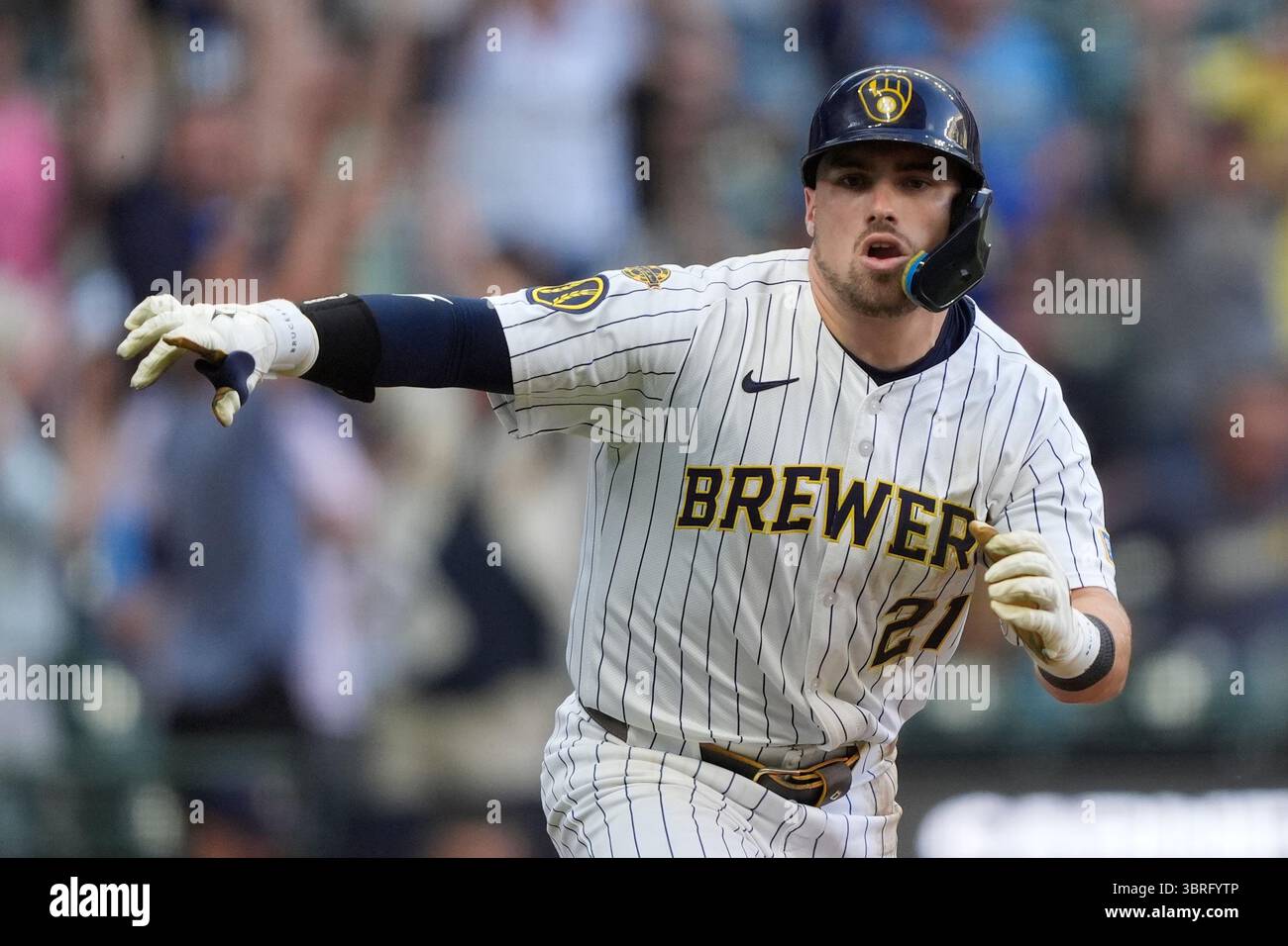 Milwaukee Brewers' Caleb Durbin gestures after hitting a walkoff single ...