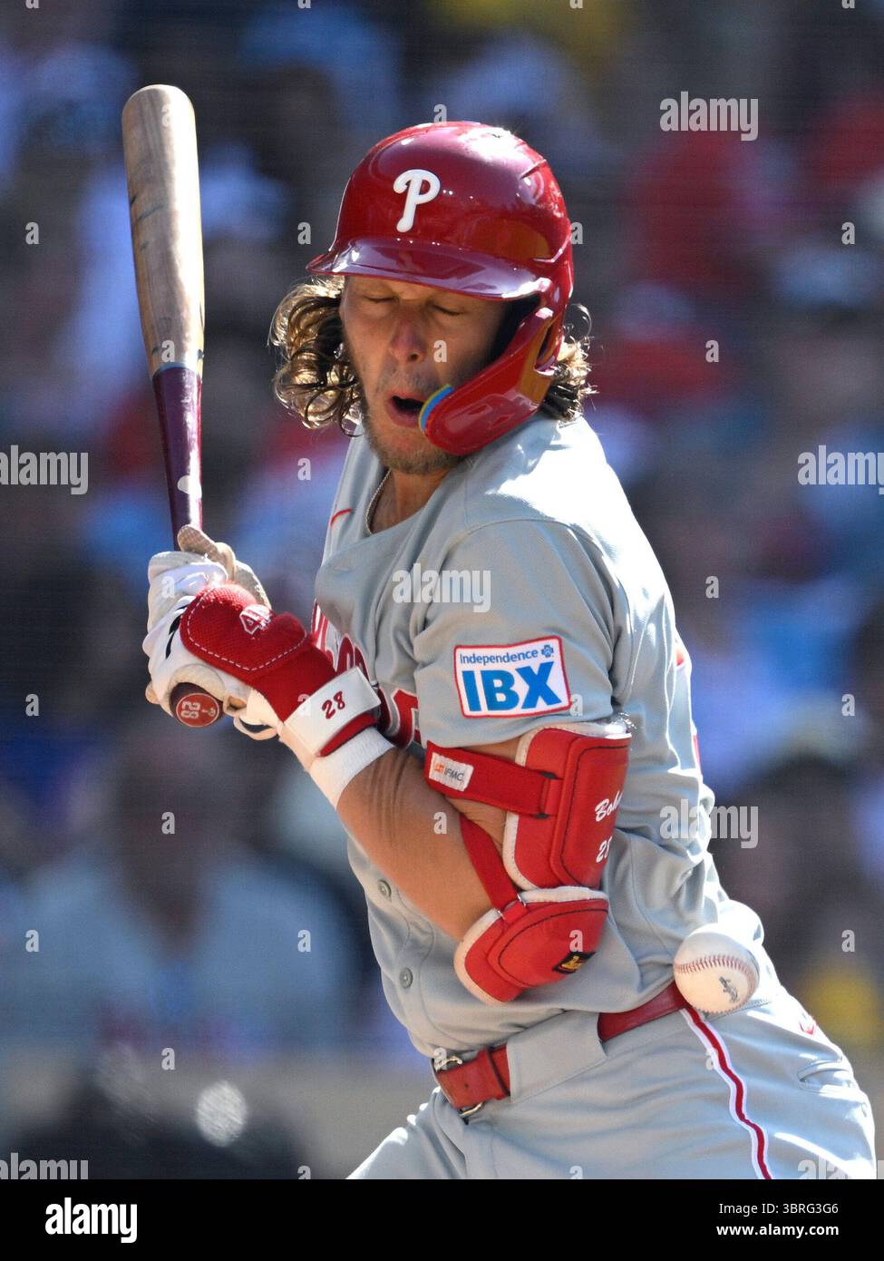 Philadelphia Phillies' Alec Bohm is hit by a pitch during the first ...