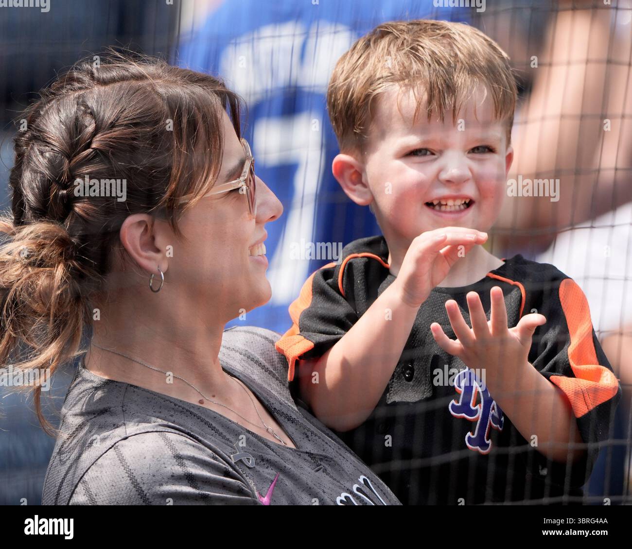 July 12, 2025: A young Mets fan gets ready for the game with his mother ...
