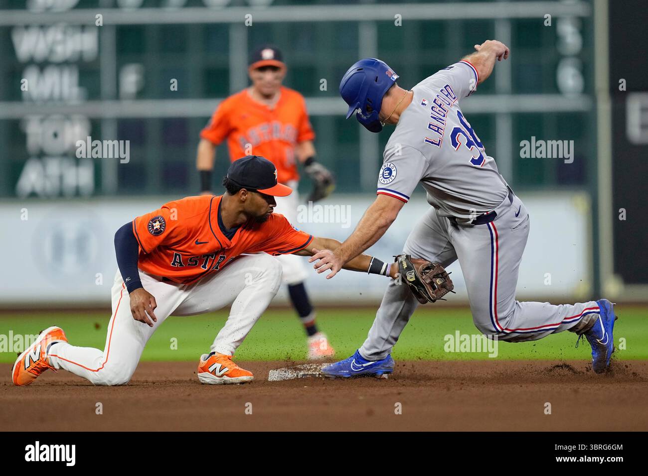 Texas Rangers' Wyatt Langford (36) steals second base as Houston Astros ...