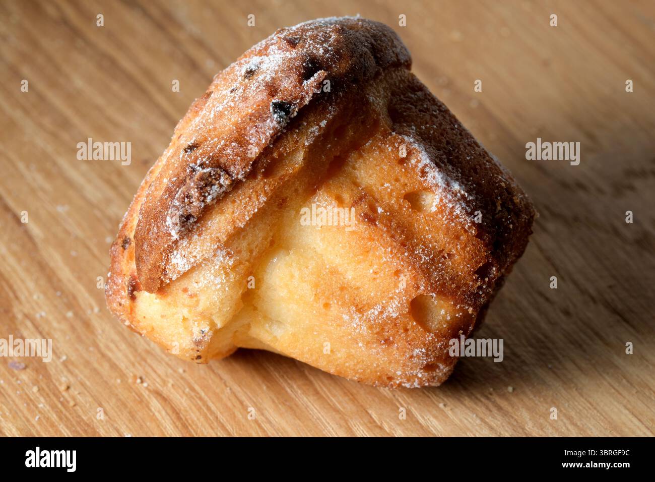 Golden muffin showcases a crumbly top, ready to delight taste buds ...