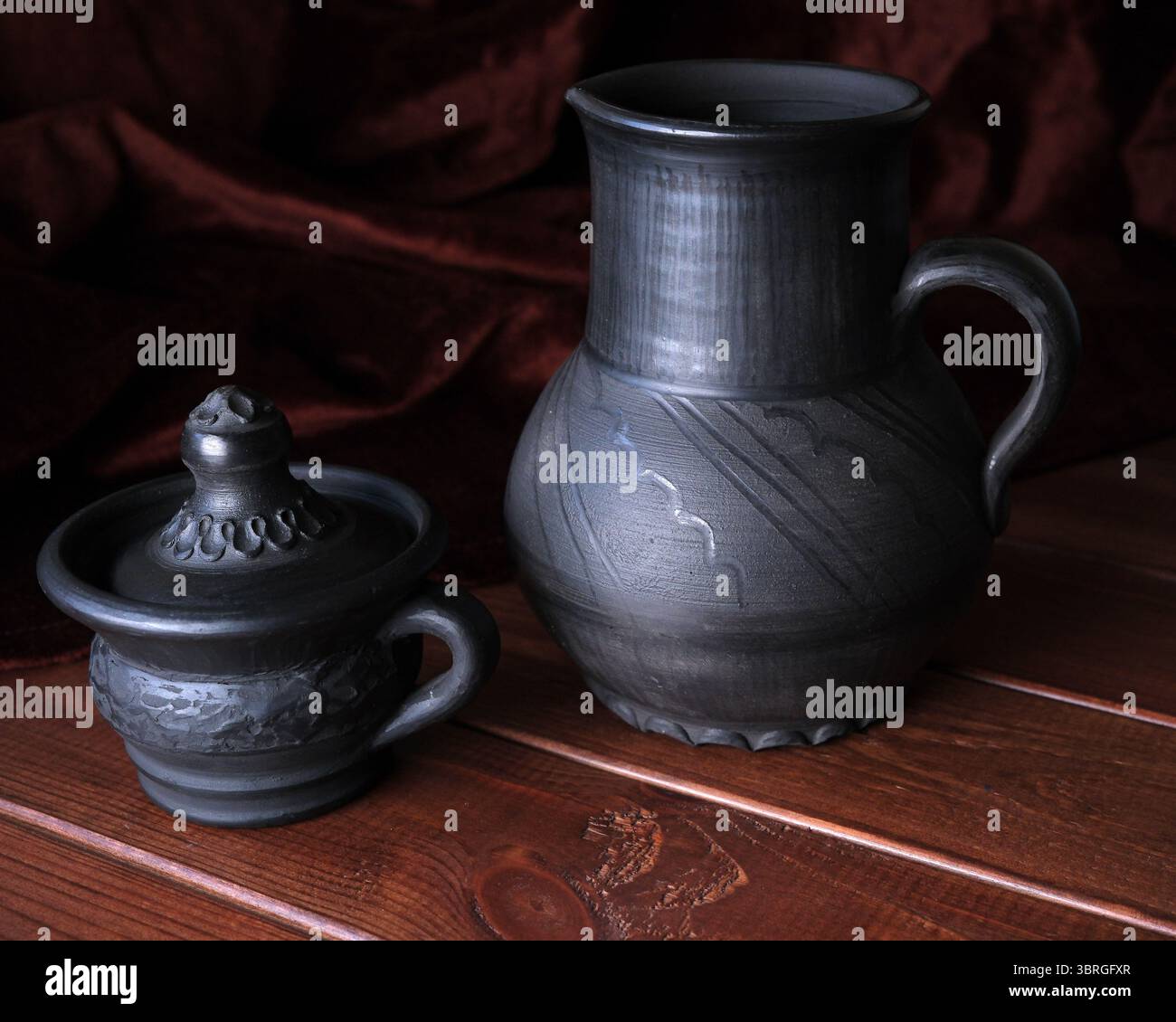 Stunning black ceramic pieces showcase traditional artistry and detail ...
