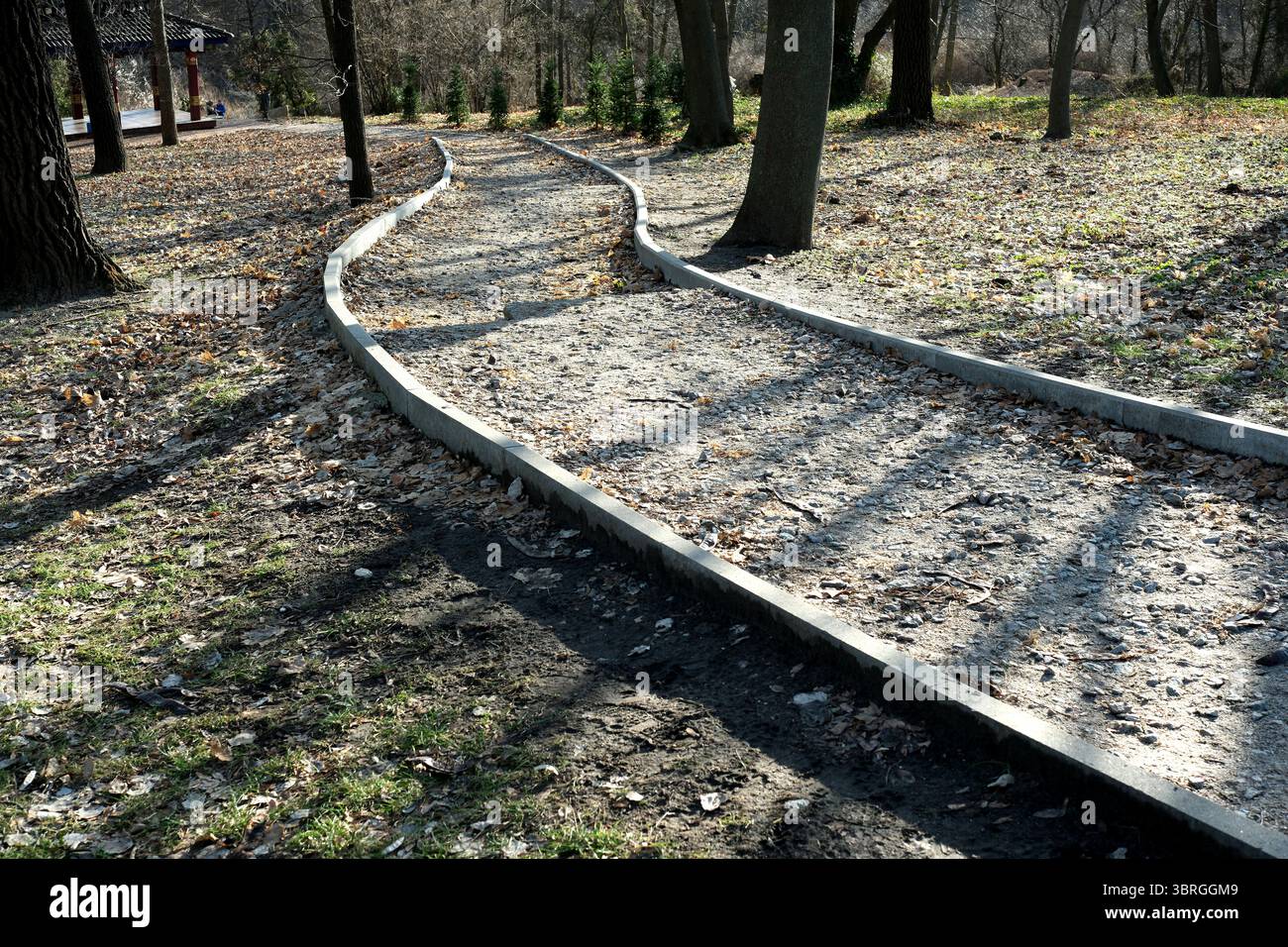 A peaceful pathway curving gracefully through a quiet nature area Stock ...