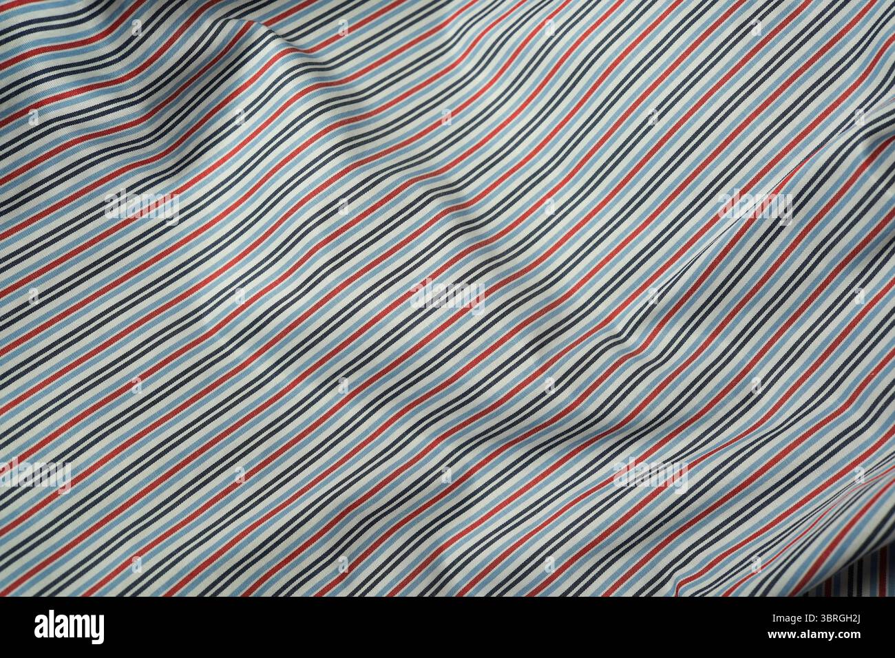Vibrant stripes dance across soft fabric, catching the daylight ...
