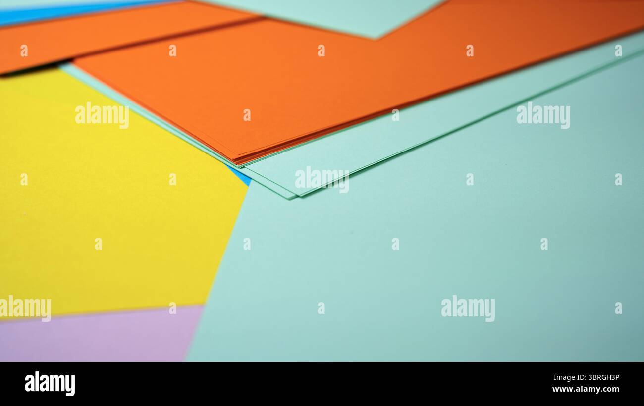 Brightly colored sheets of paper invite creativity and artistic ...